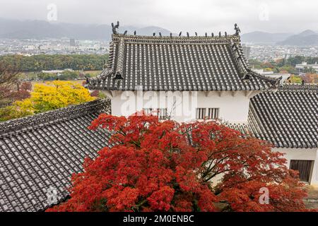 Himeji, Japan. Aerial view of the curved gables and rooftop tiles of ...