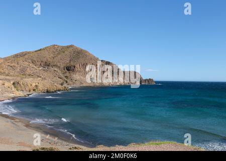 The Penon Blanco beach in Isleta del Moro village in Cabo de Gata ...