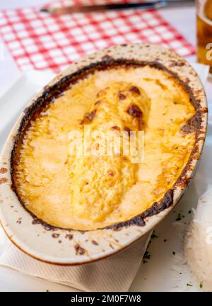 Quenelle, speciality of Lyon, oval-shaped dumplings filled with pike ...