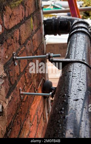 External wall insulation pipe stand off Stock Photo - Alamy