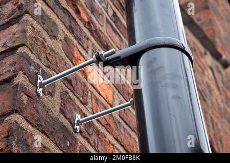 External wall insulation pipe stand off Stock Photo - Alamy
