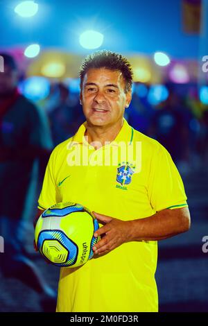 Brazilian soccer player, celebrating with the fans, on a white ...