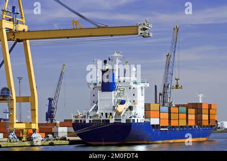 Loaded container ship at sea example Stock Photo - Alamy