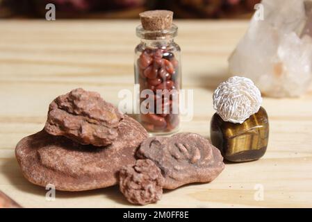 Desert Rose Rock Varieties With Jar of Agate Stones Stock Photo - Alamy