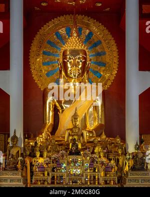 View of Viharn Luang or main vihara gable with gilded wood carving at ...