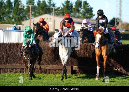 Foxboro ridden by jockey Harry Kimber (centre) on their way to winning ...