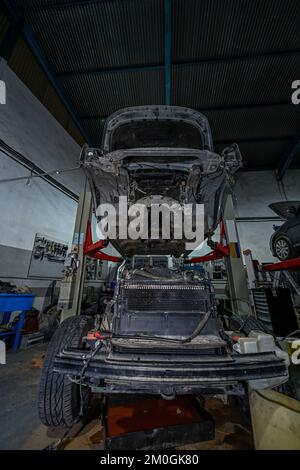 Chassis and bodywork of a car, being repaired in the mechanical ...