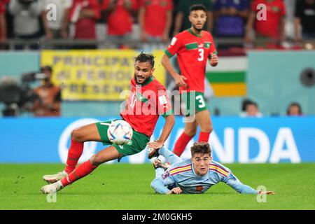 Pablo Martin Gavi of Spain and Sofiane Boufal of Morocco during the ...