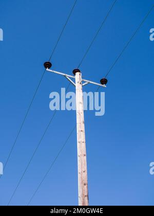 A three phase 11kv electricity power line terminating in a two phase ...