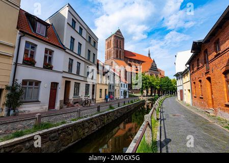 Hanseatic houses before the Church of St. Nicholas, Unesco world ...