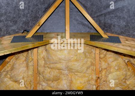 Insulation of walls and ceiling in the attic made of mineral wool ...