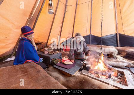 Sweden, Norbotten County, Jokkmokk, traditional costumes hanging on the ...