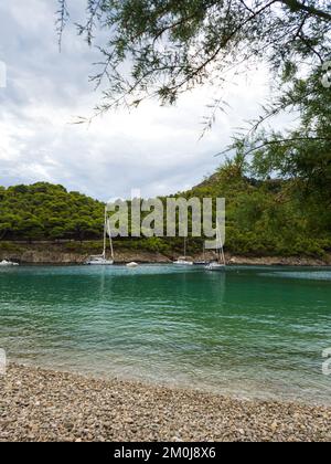 A view at green bay of Asos village, greek nature and turquoise Ionian ...