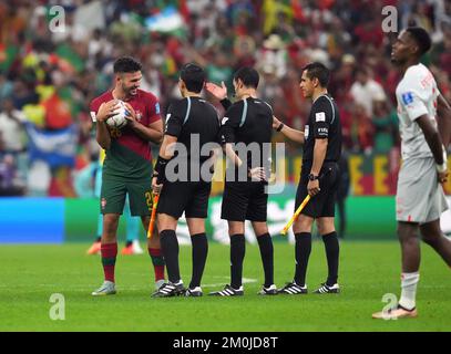 Portugal's Goncalo Ramos (left) celebrates with his hat-trick ball ...