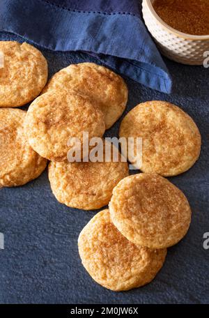 High angle view of homemade snickerdoodle cookies in a white plate on a ...