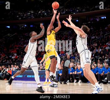 Iowa guard Ahron Ulis (1) shoots over Georgia Tech guard Miles Kelly ...