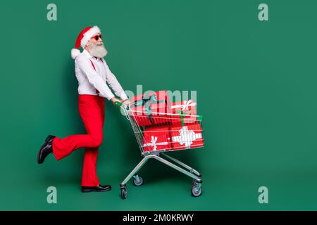 Full length photo of dreamy sweet man dressed orange t-shirt smiling ...