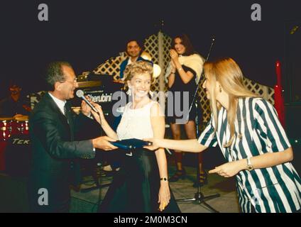 Italian singer and journalist Paolo Occhipinti aka John Foster (left ...