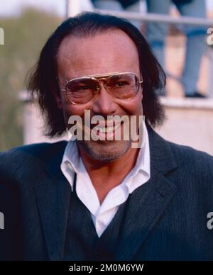 Italian singer-songwriter Antonello Venditti posing with Telegatto ...