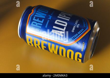 An empty can of Brewdog ALD IPS beer isolated against a yellow ...