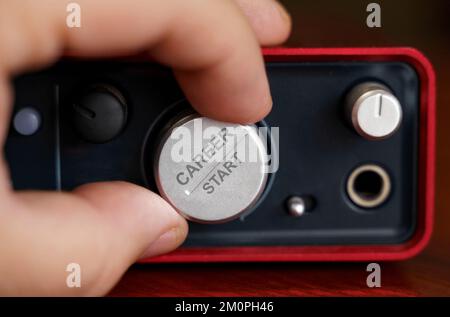 Business and economy concept. The businessman turns the regulator on ...