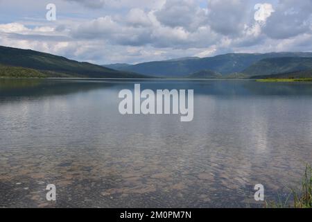 Wonder Lake reflecting the mountains Stock Photo - Alamy