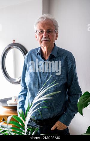 Bamberg, Germany. 08th Nov, 2022. Paul Maar poses at his desk for a ...