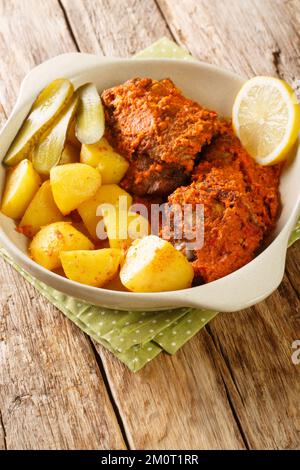 Macanese African Chicken Galinha a Africana close up on the pot on the ...