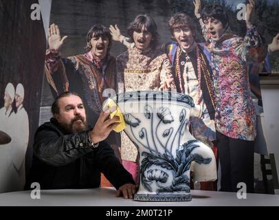 Roag Best gives a final polish to John Lennon's toilet from his ...