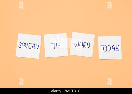 Hand writing sign Spread The Word. Word Written on share the ...