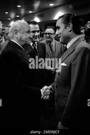 Argentine Navy Commander Eduardo Emilio Massera (right) greets ...