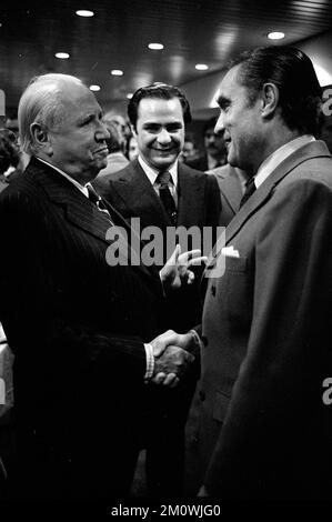 Argentine Navy Commander Eduardo Emilio Massera (right) greets ...