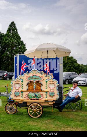 Man with organ outdoors Stock Photo - Alamy