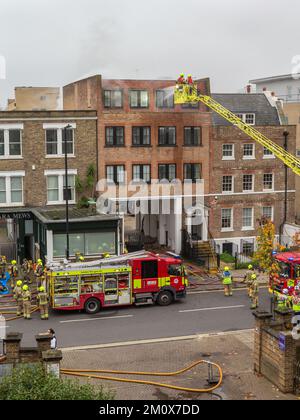 Fire Brigade attend to a fire in a residential building Stock Photo - Alamy