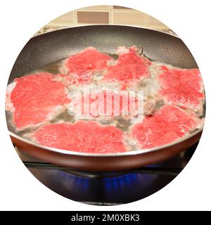 Fresh red cow tenderloin frying in pan on stove, homemade very healthy ...