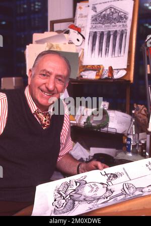 Washington Post editorial cartoonist Herbert L. Block stands in his ...