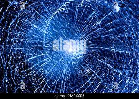 Bullet impact on a sheet of glass Stock Photo - Alamy