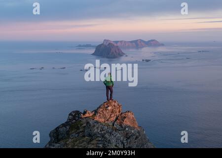 Hiker on Hellsegga plateau, Lofoten Islands, Norway Stock Photo - Alamy