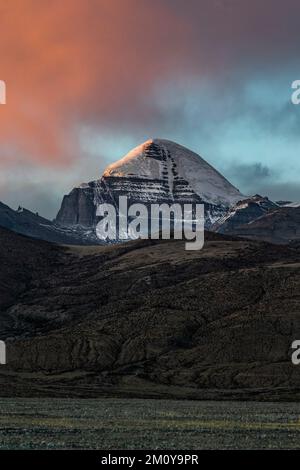 A vertical shot of sunset with Mount Kailash in Taqin County, Ali ...