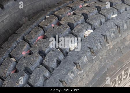 Retread tire on farm truck. Rubber recycling, trucking industry, tire ...