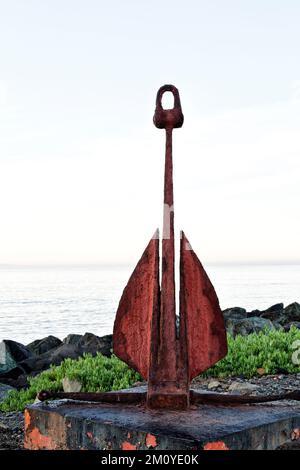 Classic 'Danforth' fluke-style boat anchor, overlooking Pacific Ocean ...