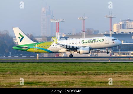 Salam Air airline Airbus A320 aircraft landing. Airplane A320neo of SalamAir, a low-cost airline ...