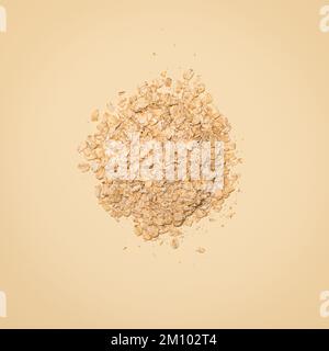 A great source of iron. raw rolled oats against a studio background ...
