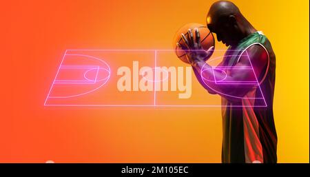 Side view of stressed bald african american player holding ball on ...