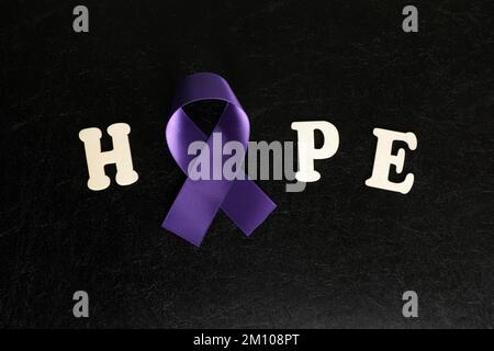 Word CANCER on color background Stock Photo - Alamy