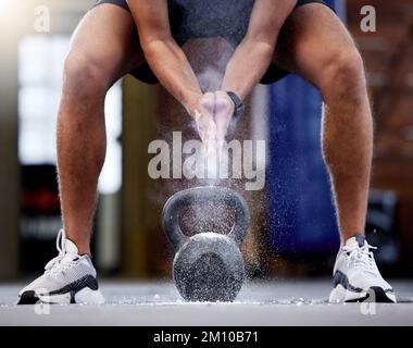 Fitness, hands and powder at kettlebell in gym for workout, exercise ...