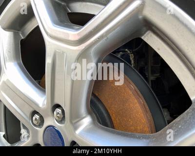 car brake disc and pad rusted after the rain Stock Photo - Alamy