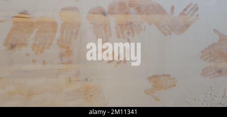 handprints on a dusty table Stock Photo - Alamy