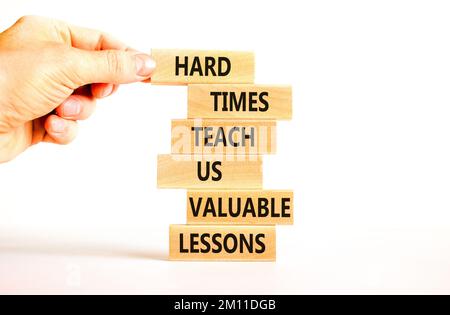 Lesson from hard times symbol. Concept words Hard times teach us ...