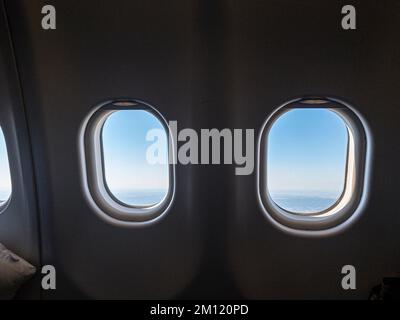 Airplane window lookout Stock Photo - Alamy